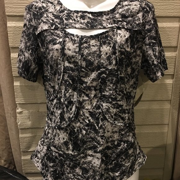 Robbi & Nikki | Tops | Robbi And Nikki Front Cutout Blouse | Poshmark